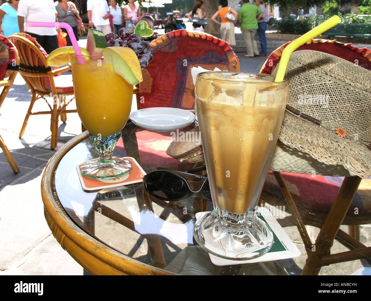 Frappe coffee and fruit juice in Athens, Greece Stock Photo - Alamy