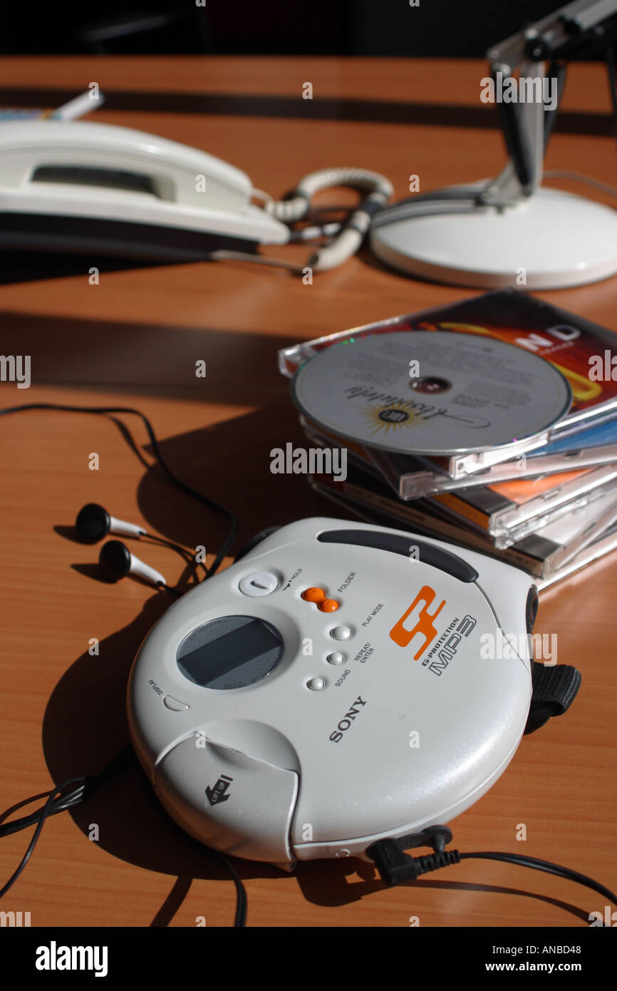 Office desktop showing an MP3 music player telephone handset and angle ...