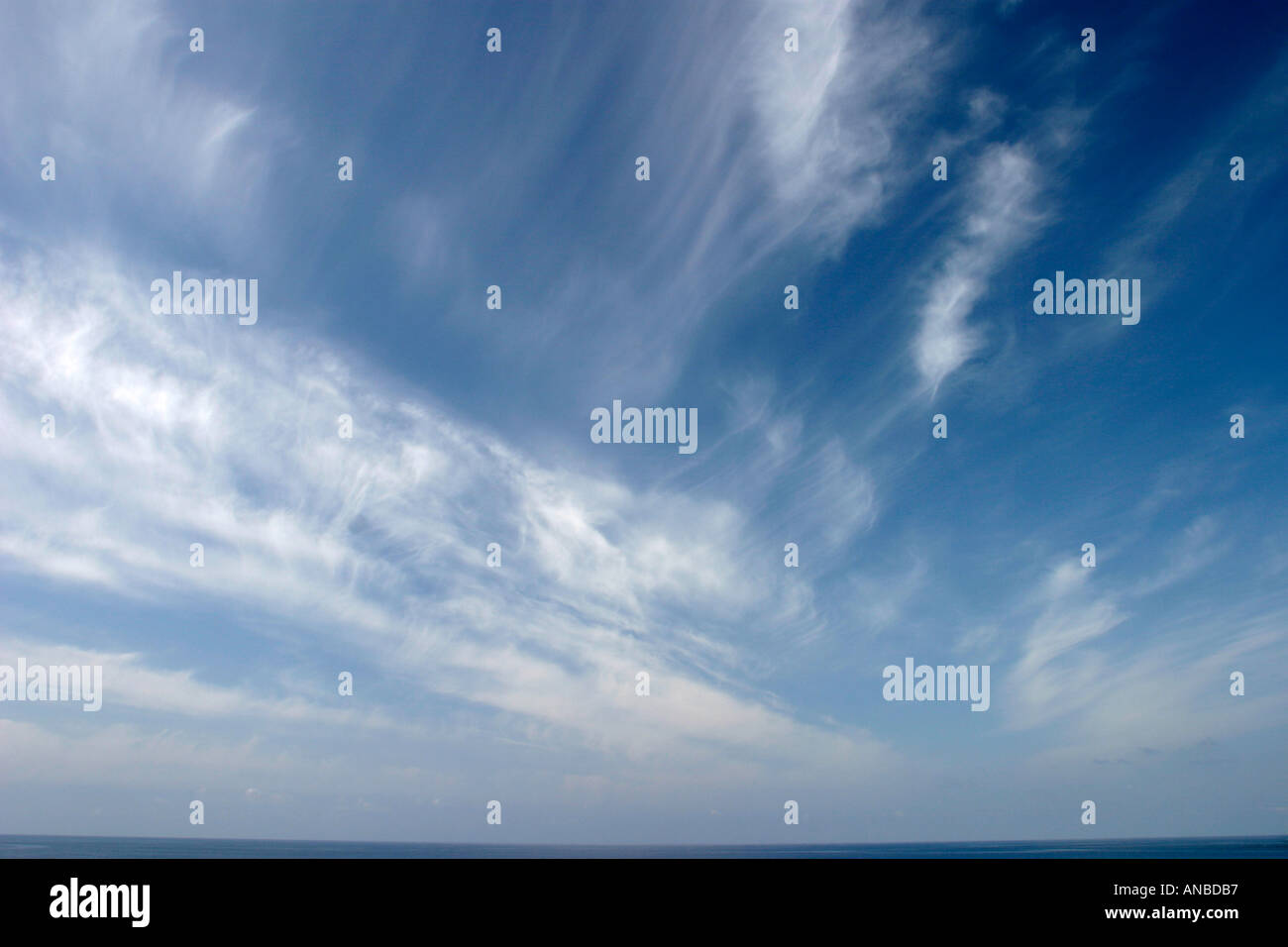Early morning, blue sky with cirrus clouds Stock Photo - Alamy