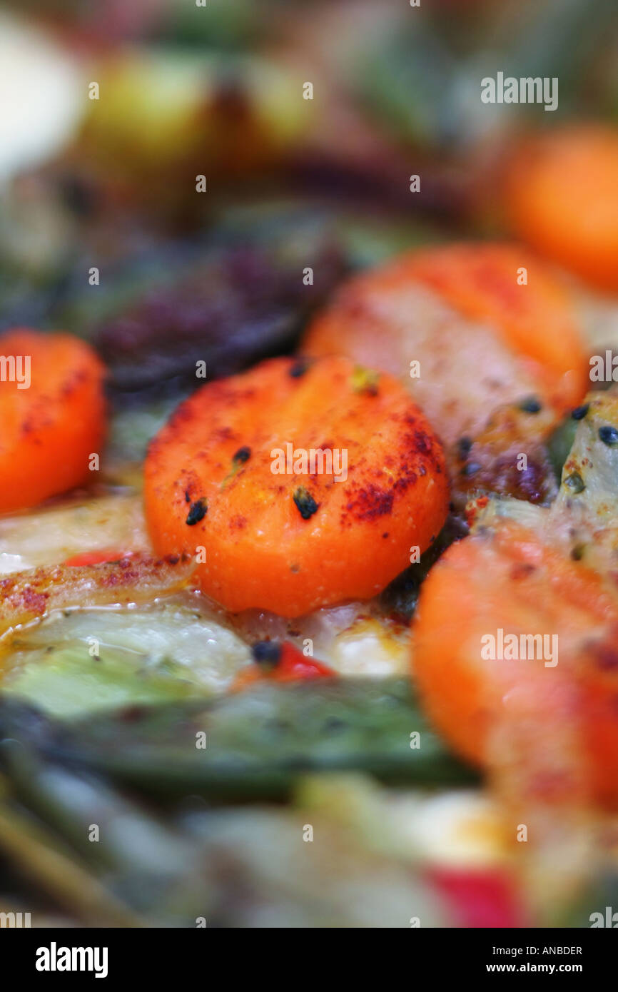 Baked fish with carrots and other vegetables Stock Photo - Alamy