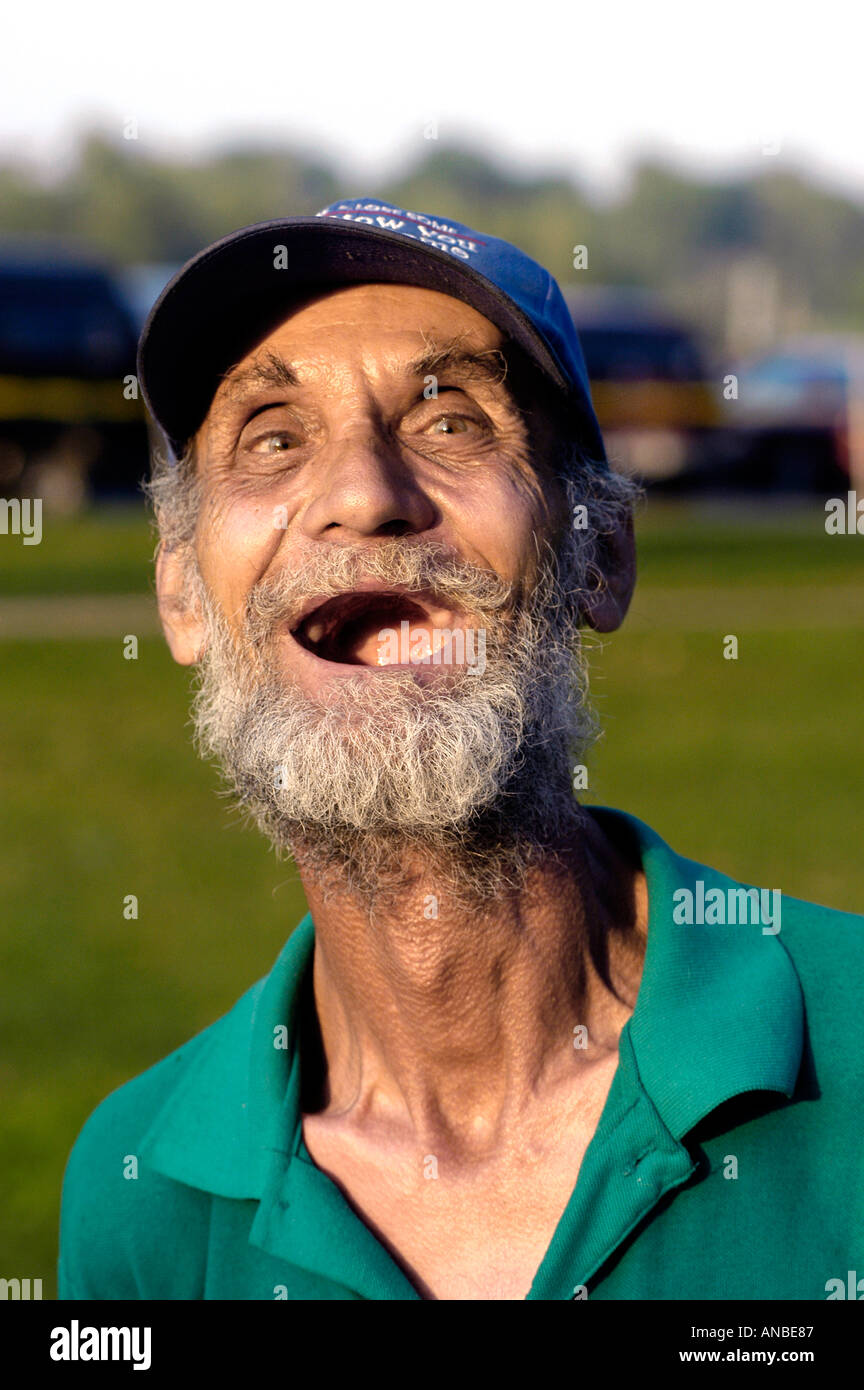 Happy Homeless Senior Male Laughing Stock Photo - Alamy