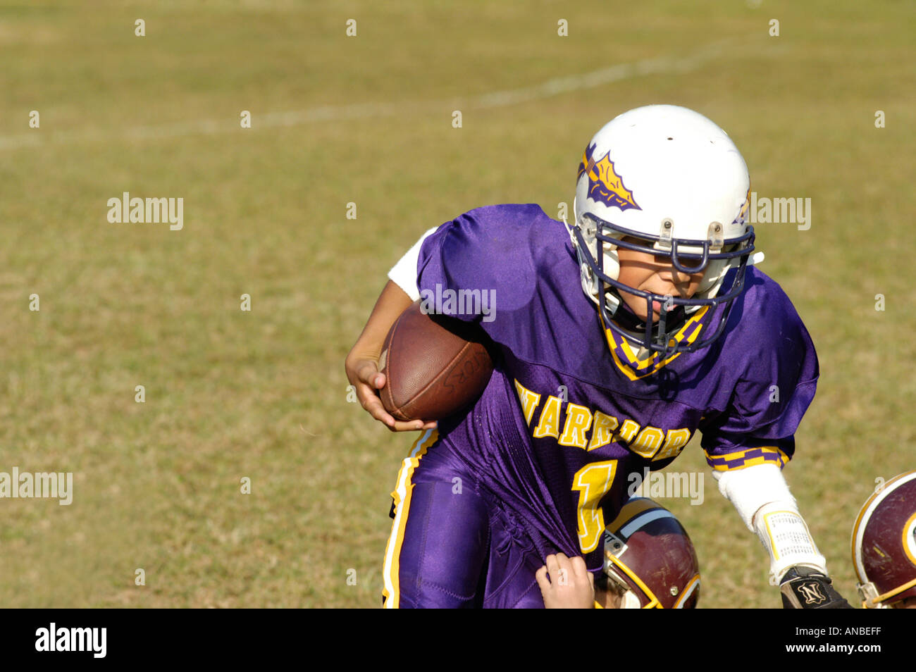 Young Afro American Boy who plays real full contact American Style ...