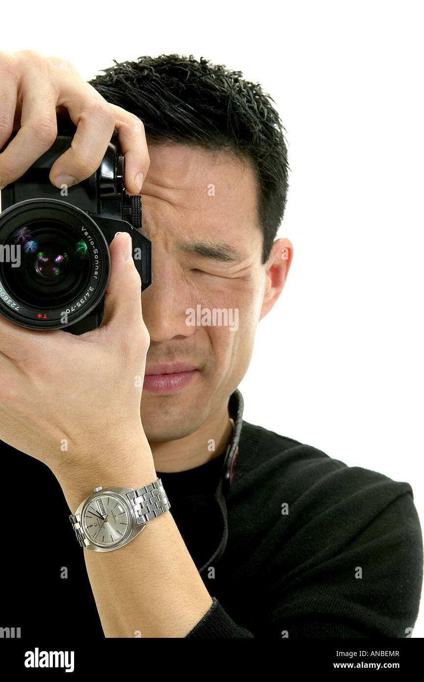 Man Looking Through Camera Stock Photo - Alamy