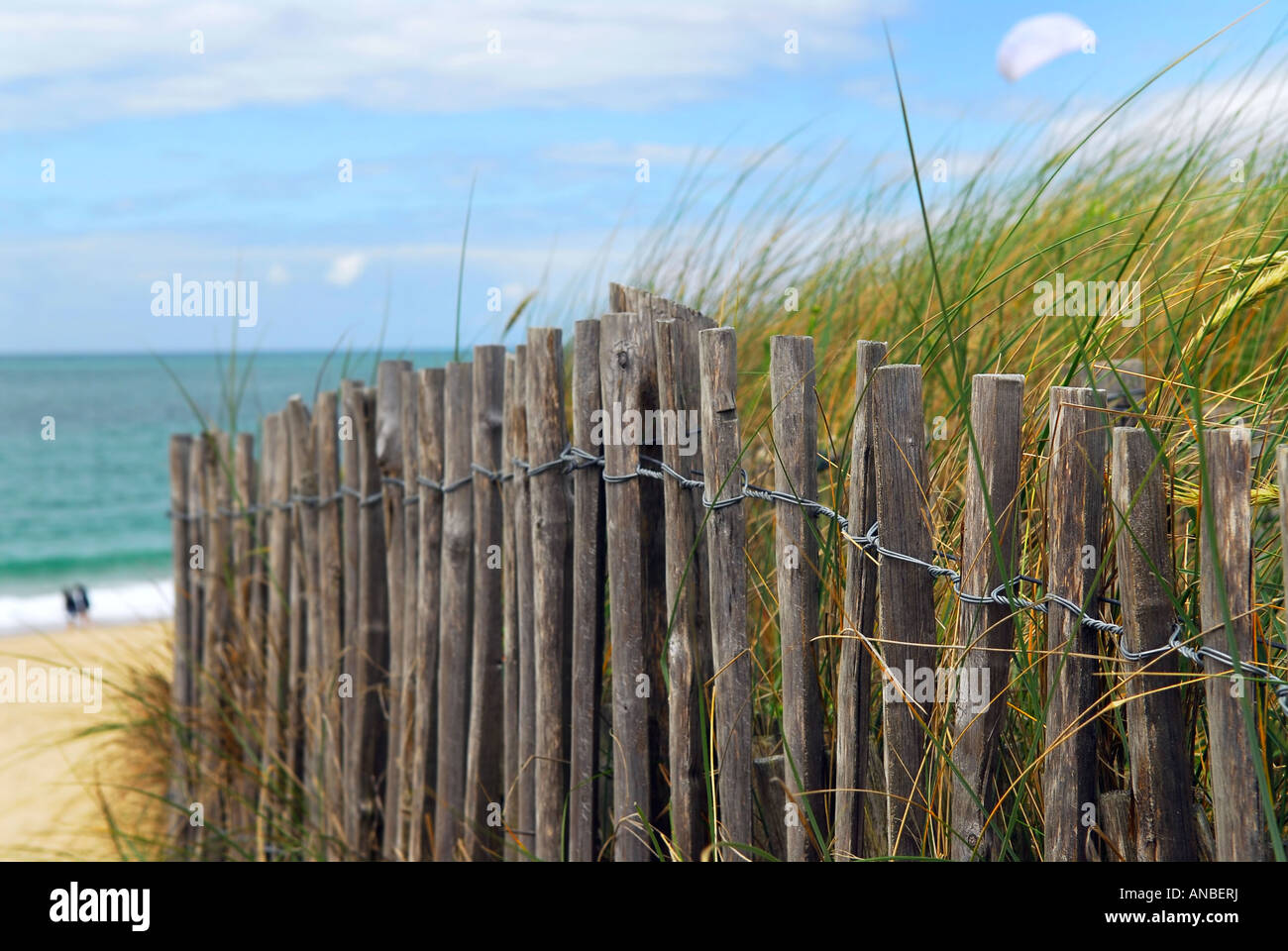 Old wooden fence on a beach in Brittany France Stock Photo - Alamy