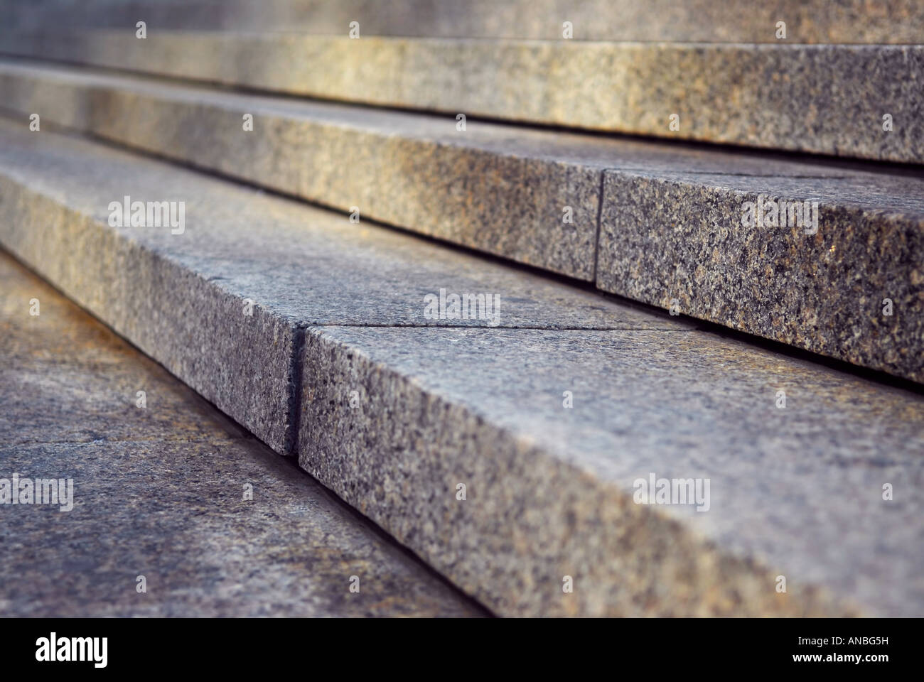 Close up on granite stairs in perspective with sunlight Stock Photo - Alamy