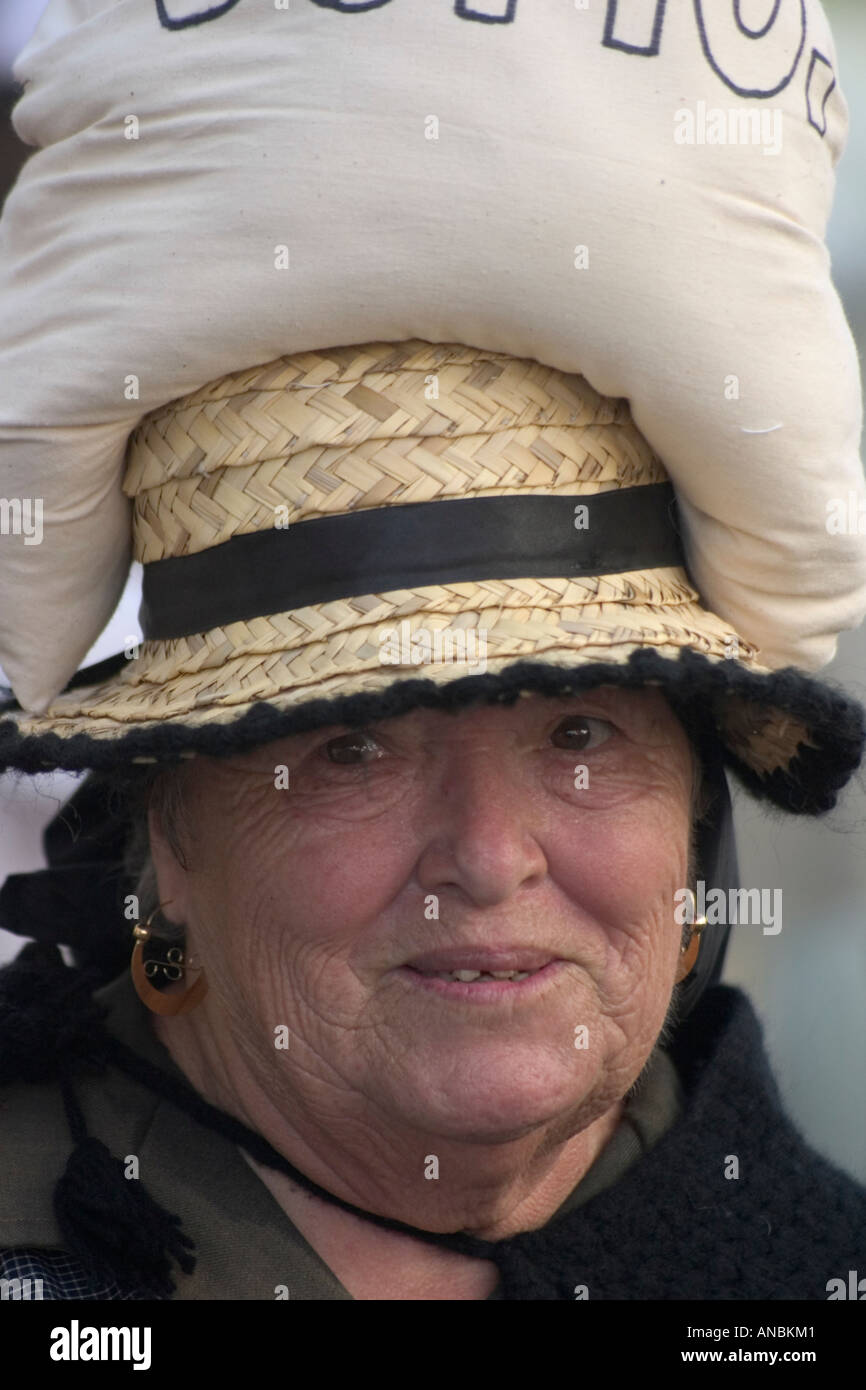 Spanish woman carrying sack on her head at Fiesta del Pino on Gran ...