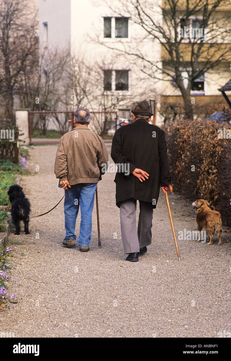 two men with dogs Stock Photo - Alamy