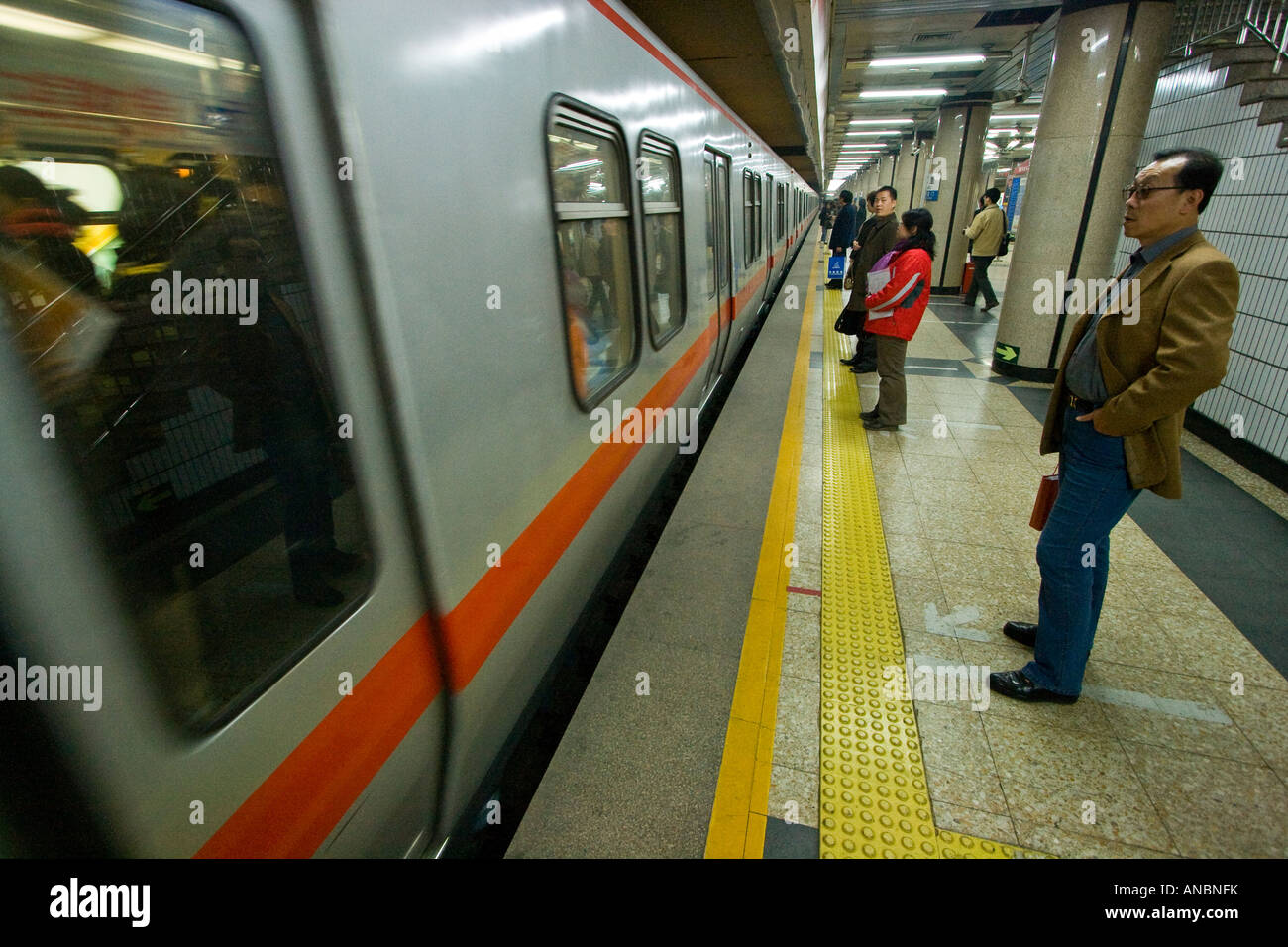 Chinese People Wait as Train Pulls into Station Platform Beijing China ...