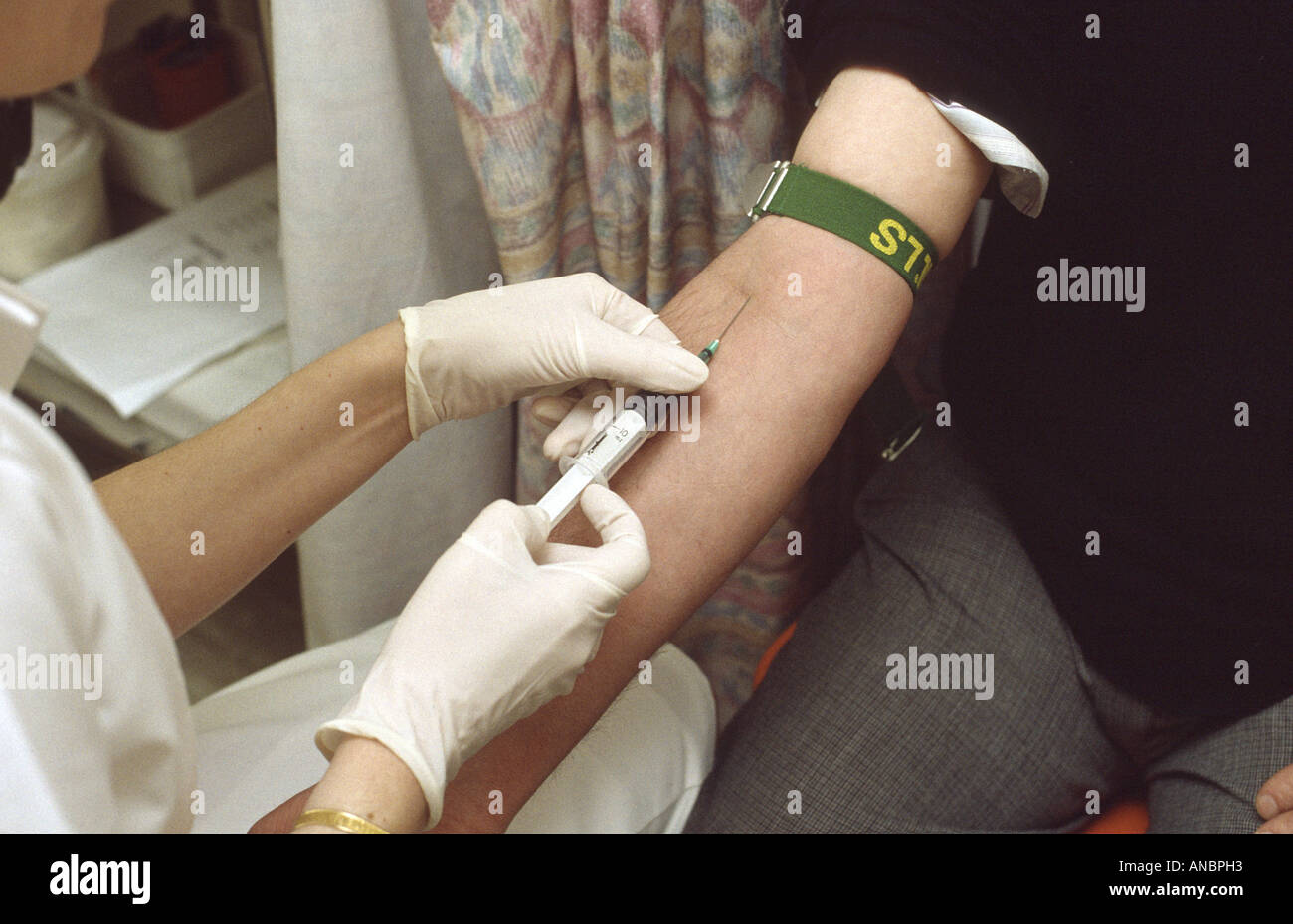 nurse taking a blood sample Stock Photo - Alamy