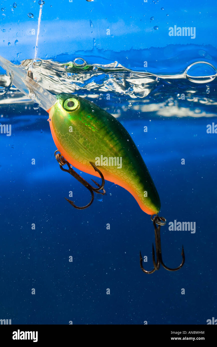 fishing bait underwater in a blue clear water Stock Photo - Alamy