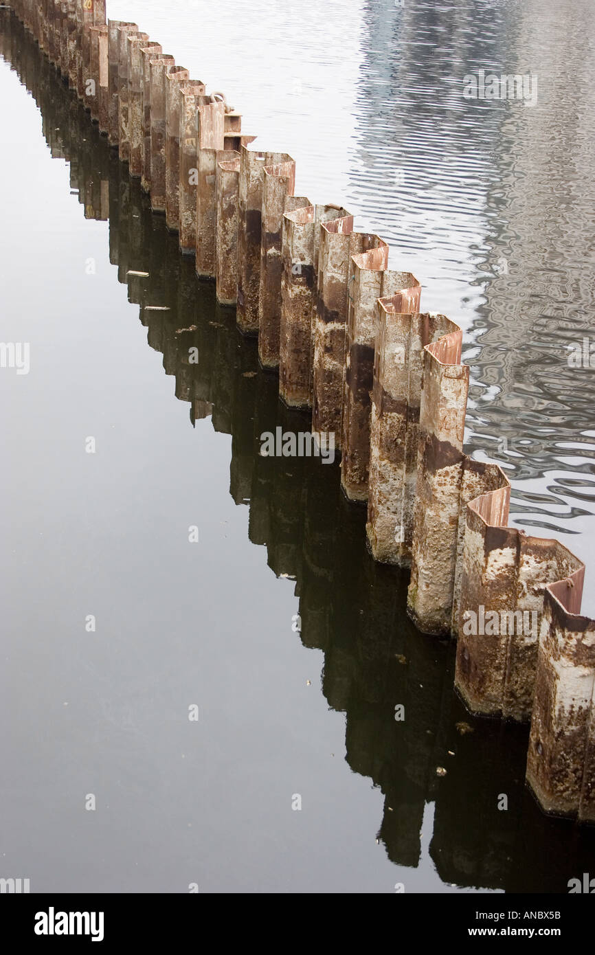 Reflected Posts in Water Stock Photo - Alamy