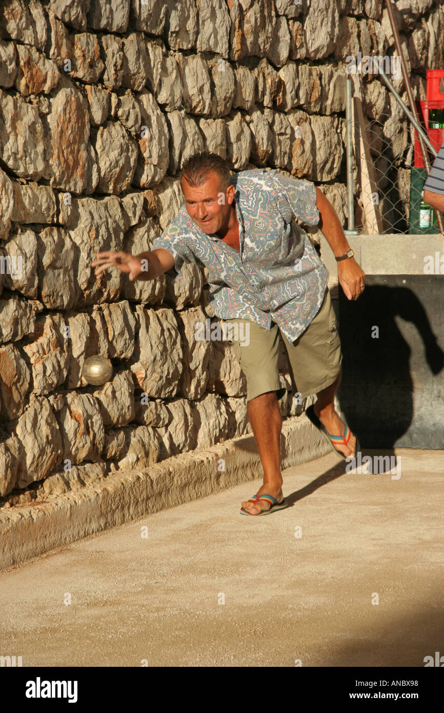Croatian men playing Bocce game Stock Photo - Alamy