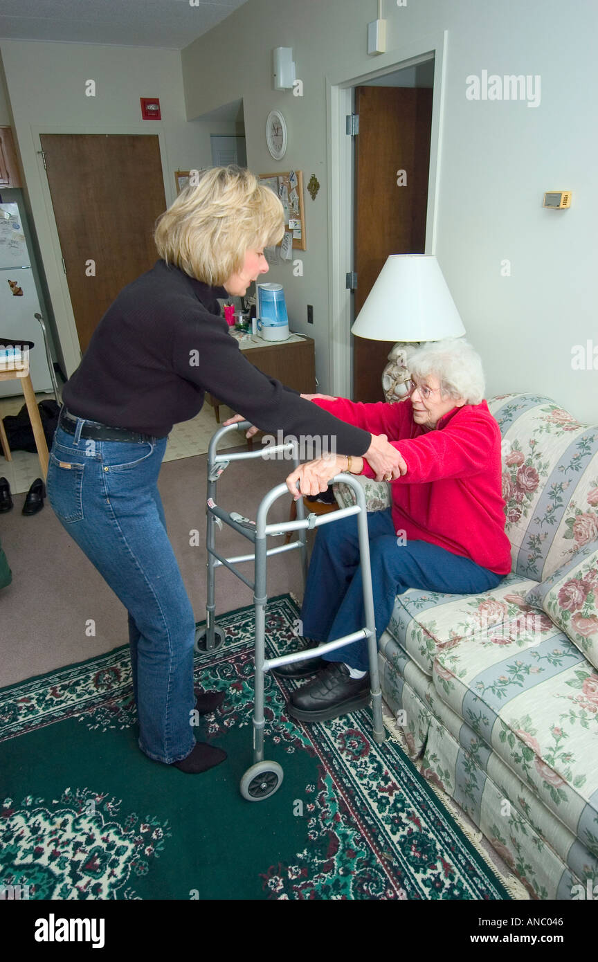 Children helping elderly hi-res stock photography and images - Alamy