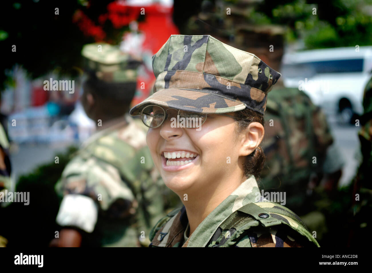 Smiling minority ethnic woman who is Hispanic Marine Corps soldier in ...