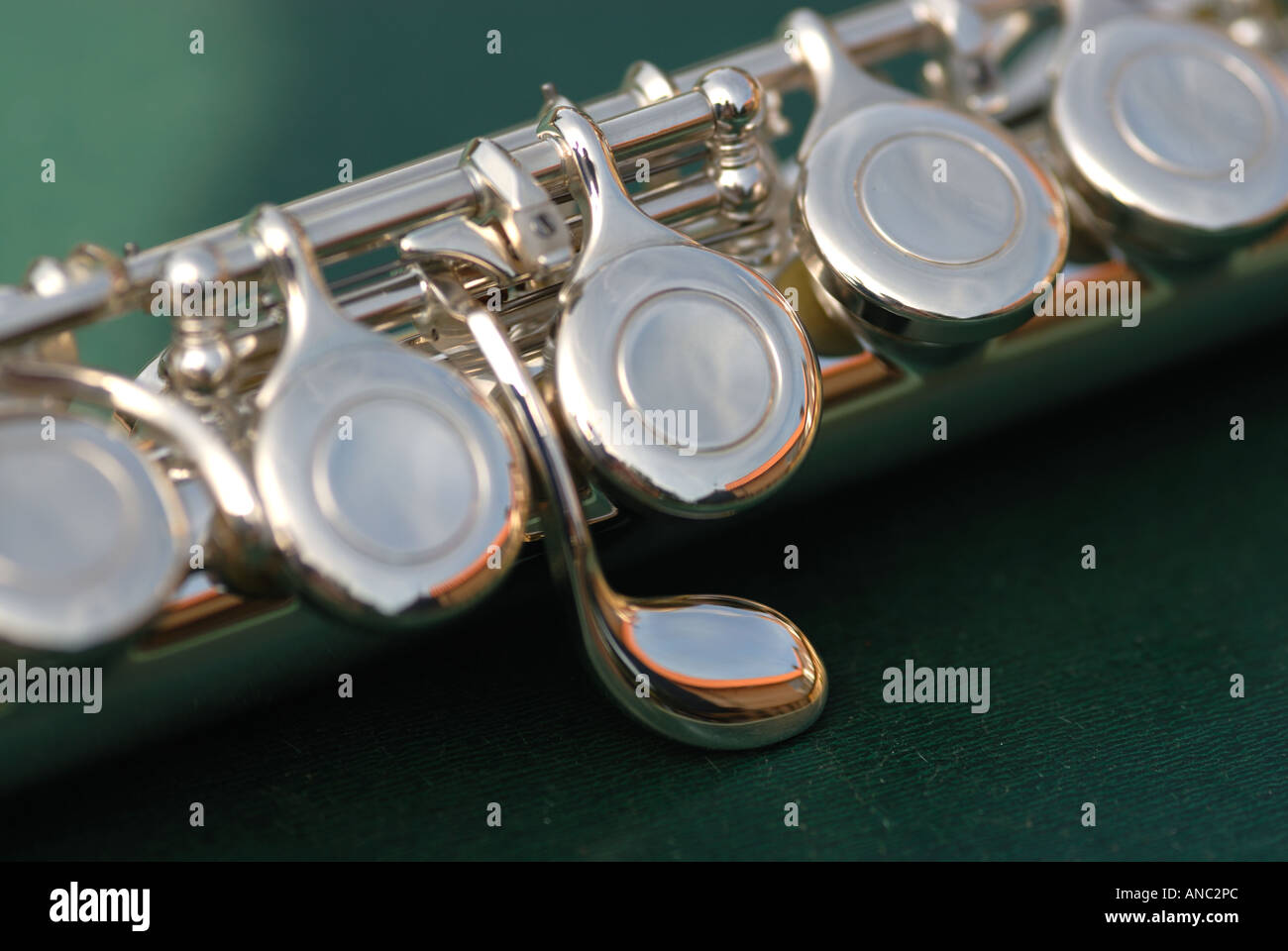 Yamaha flute on a green background Stock Photo - Alamy