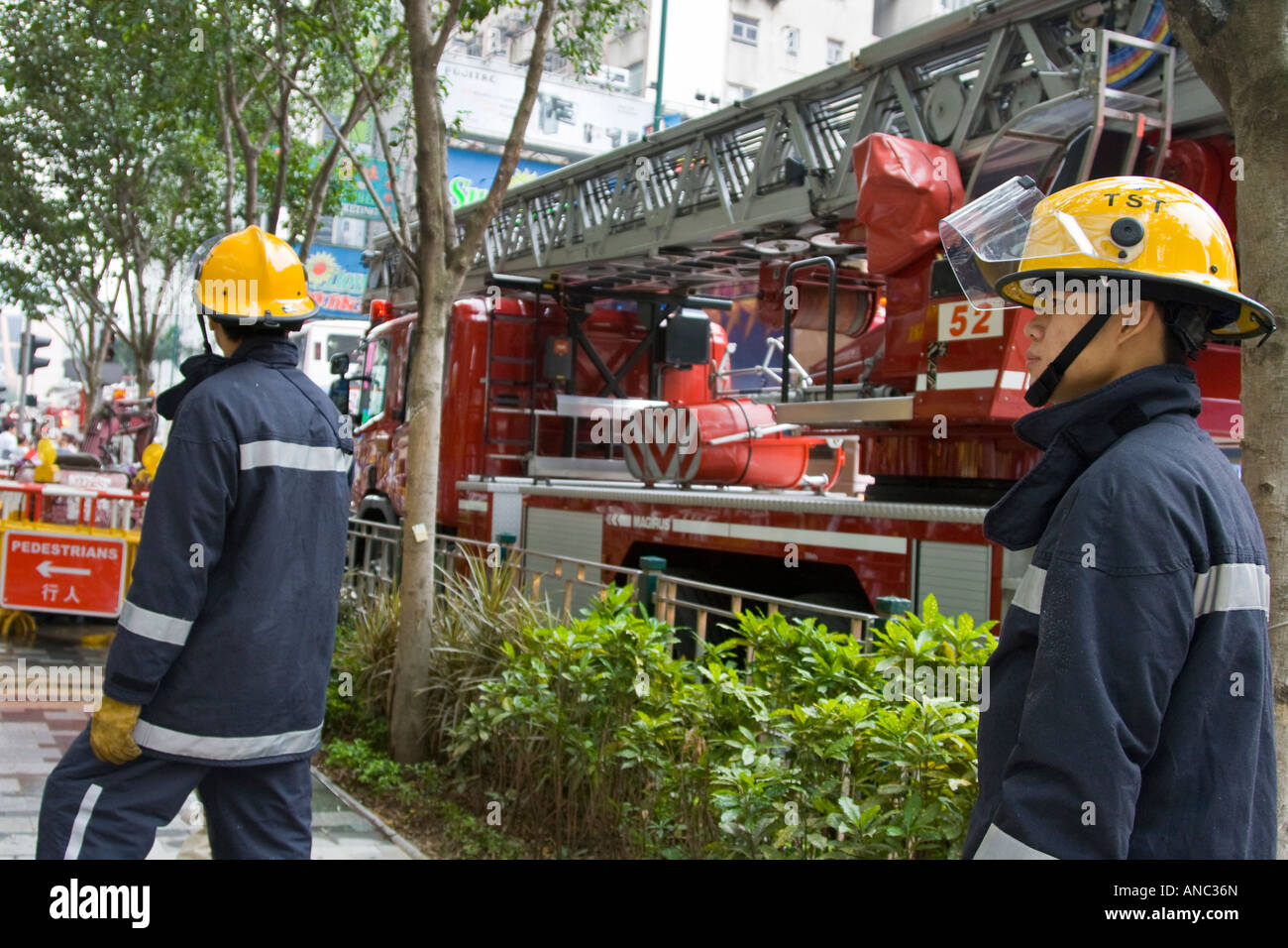 Firefighters and Fire Engine Truck Hong Kong SAR Stock Photo - Alamy