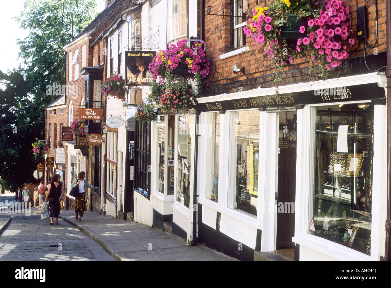 Lincoln Steep Hill shops street Stock Photo - Alamy