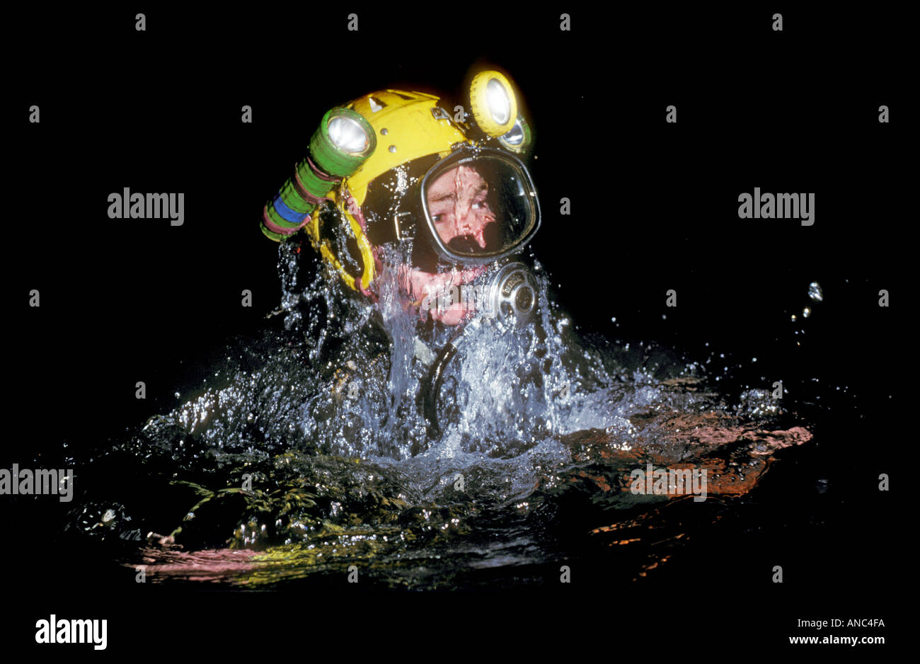 Martyn Farr cave diver emerging from a sump in Porth yr Ogof South ...