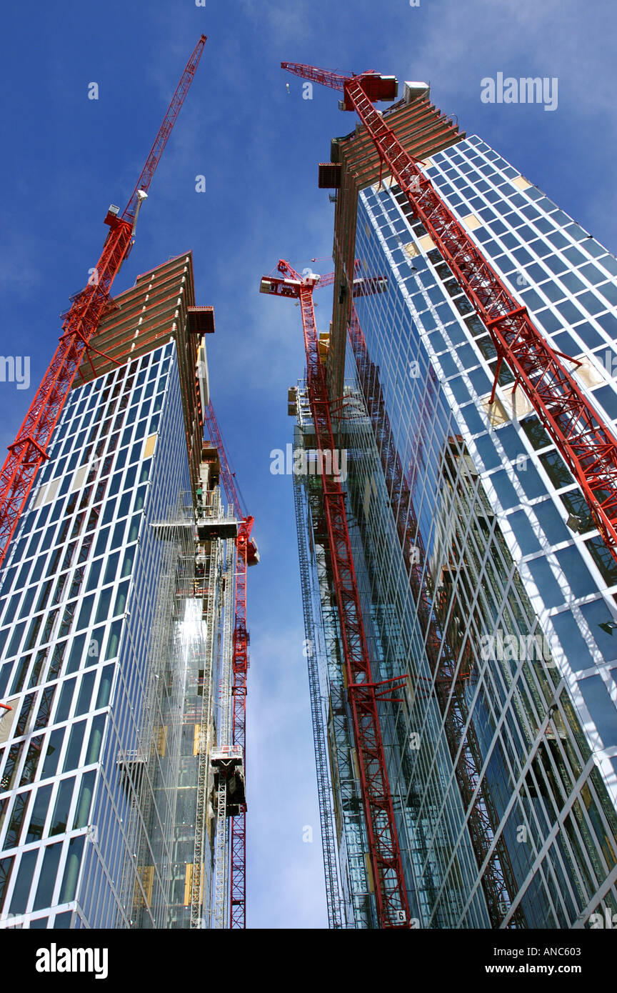 Construction site gray concrete pillar men man at work TOWERS munich ...