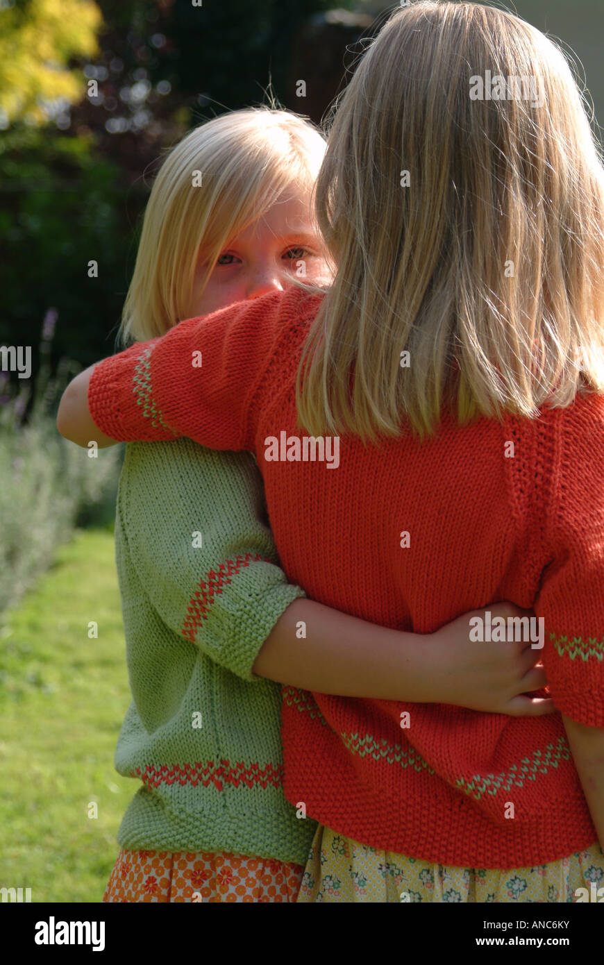 Friends walking arms around each other hi-res stock photography and ...