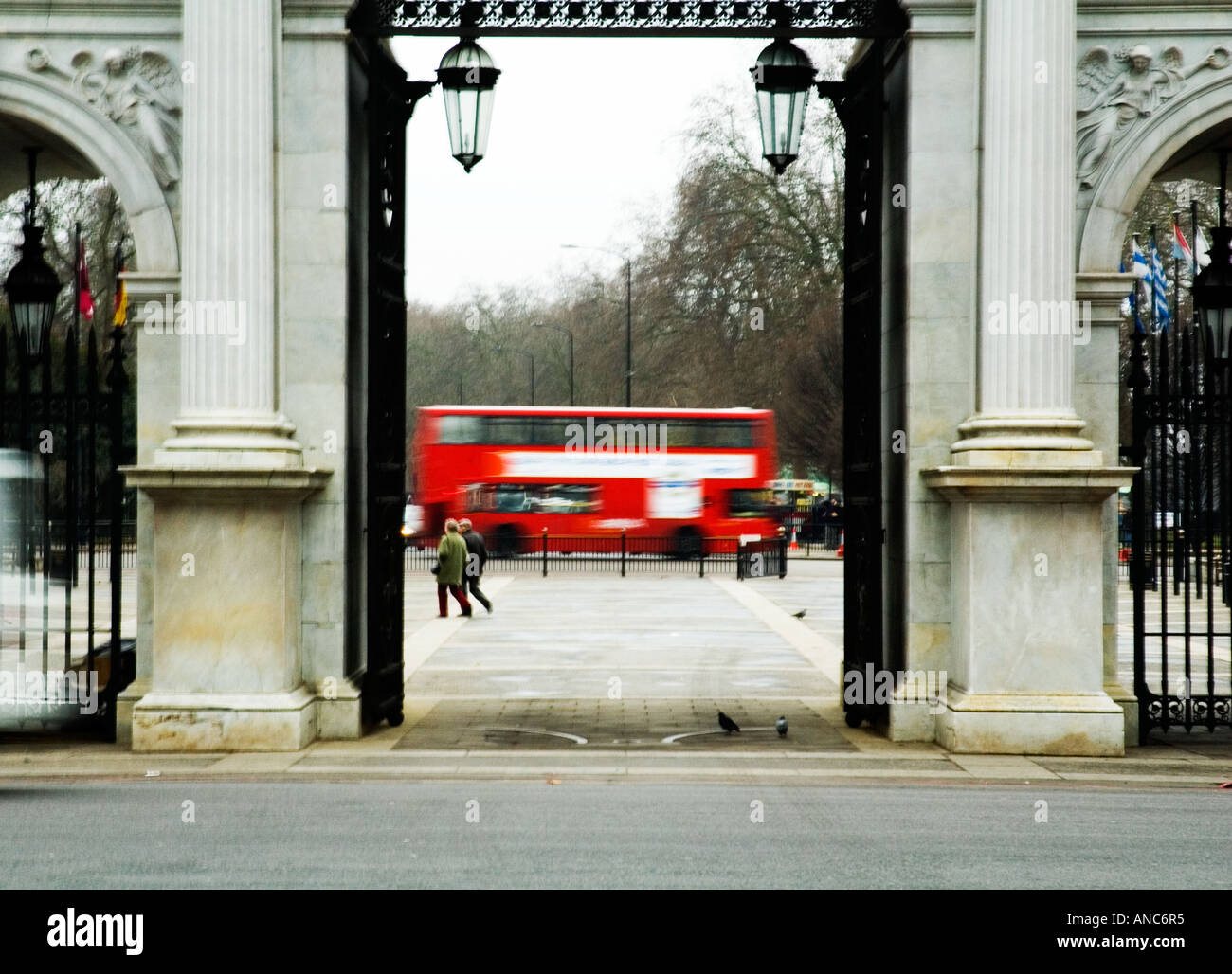 A blurred double decker bus passes marble arch Stock Photo - Alamy