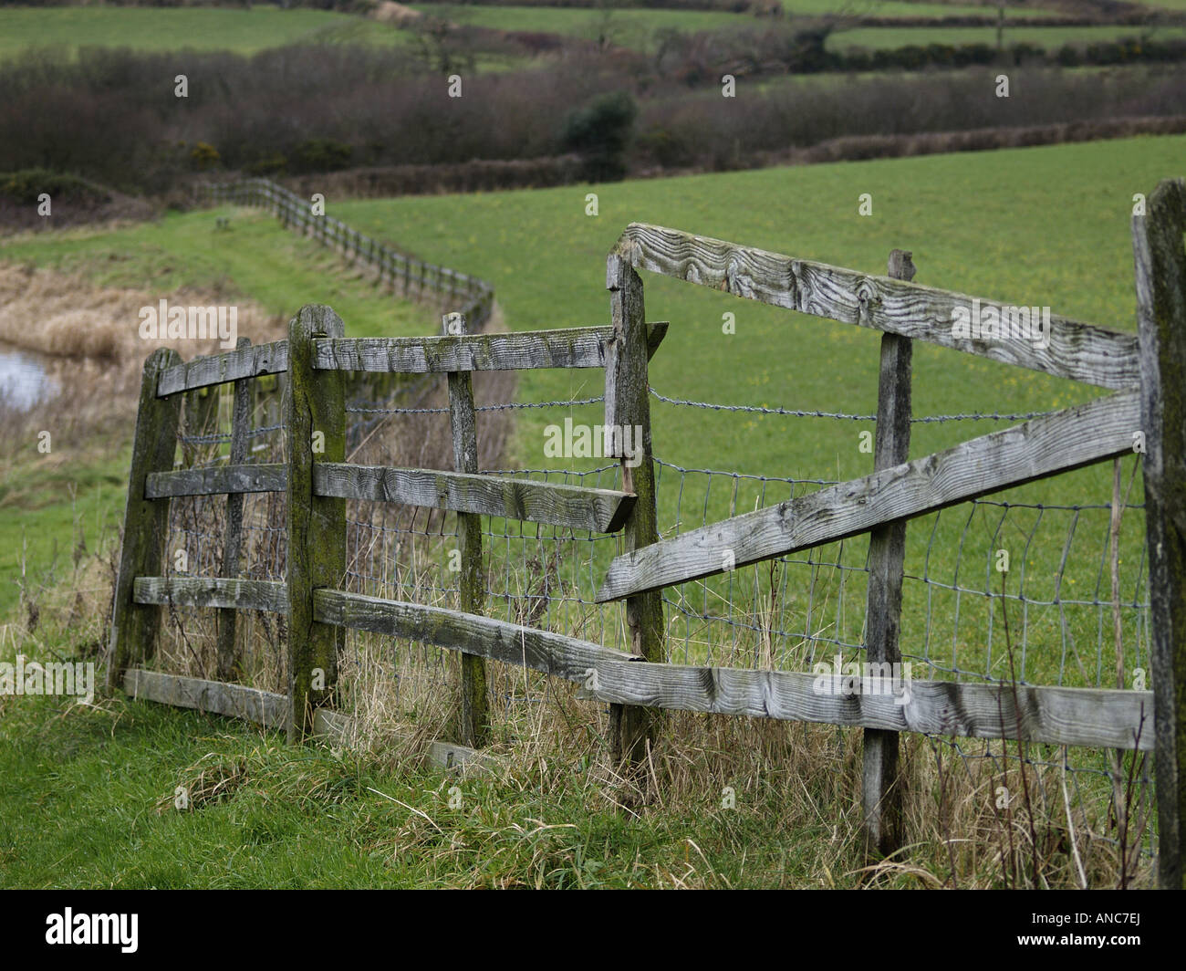 Rustic wooden fence on the boundary of a farmers field Stock Photo - Alamy