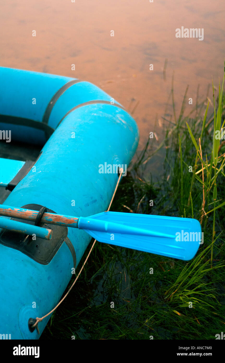 Rubber boat on a lake shore Stock Photo - Alamy