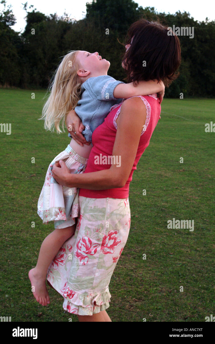 Daughter hugging mother six hi-res stock photography and images - Alamy