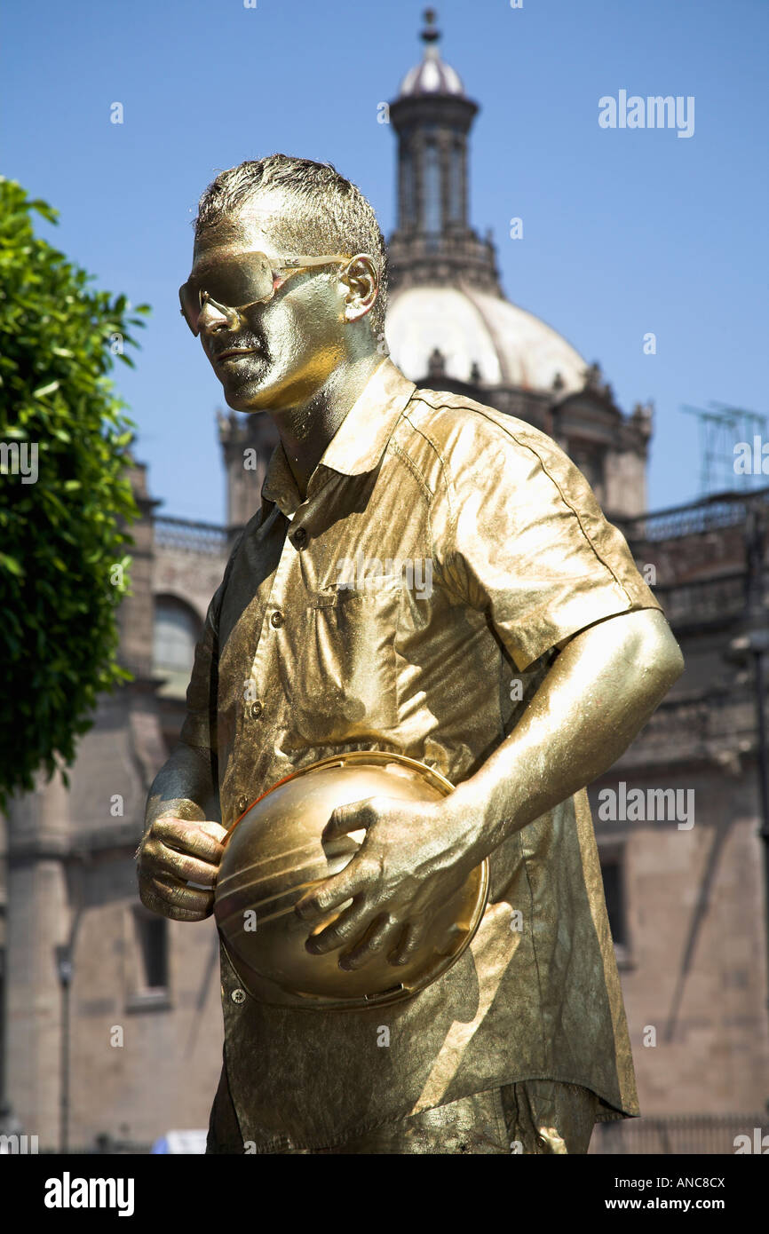 Close up of gold painted street mime artist in Zocalo Mexico Stock ...