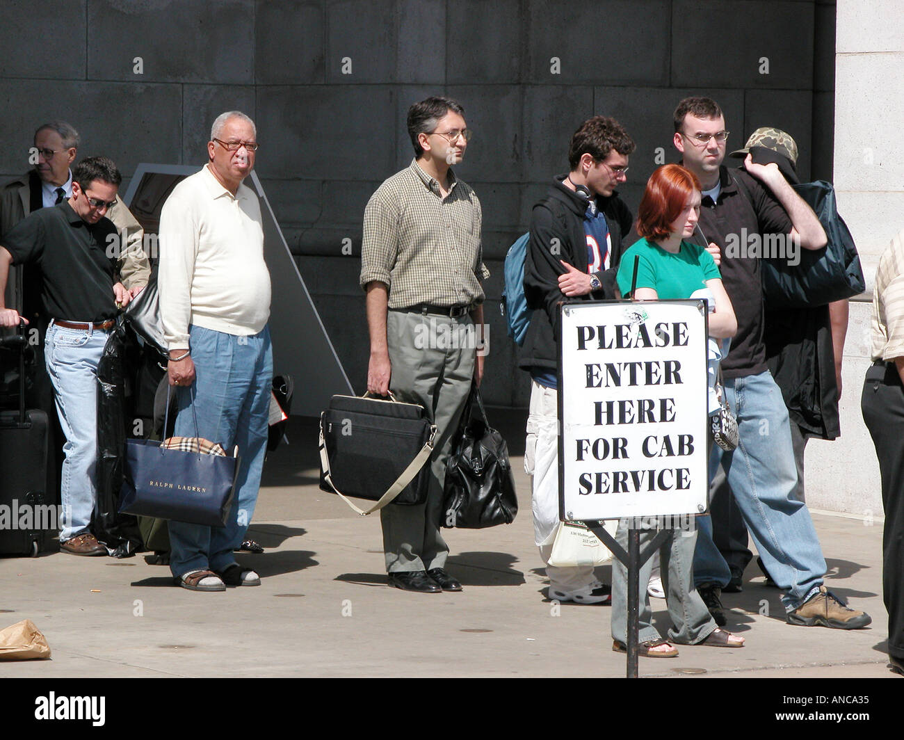 People wait in line hi-res stock photography and images - Alamy