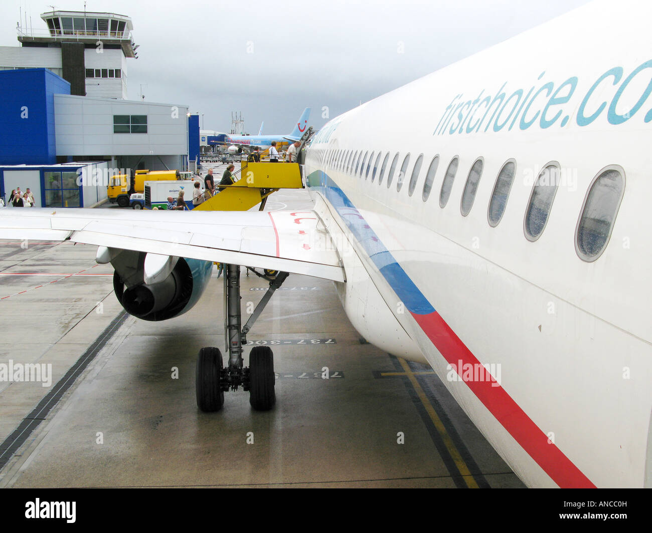 Passengers boarding First Choice aircraft for flight to Cyprus at ...