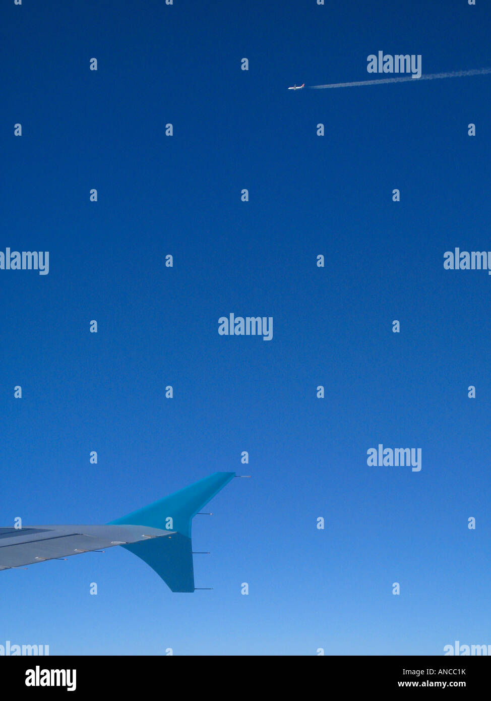 Wing of passenger jet on flight from Cardiff to Cyprus with aircraft ...