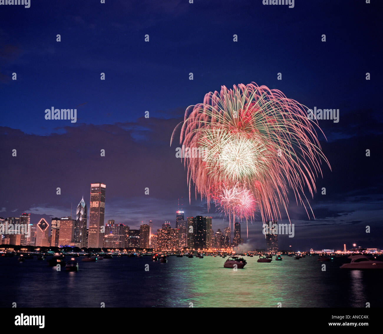 USA, Illinois, Chicago, Fourth of July fireworks over Monroe Harbor ...