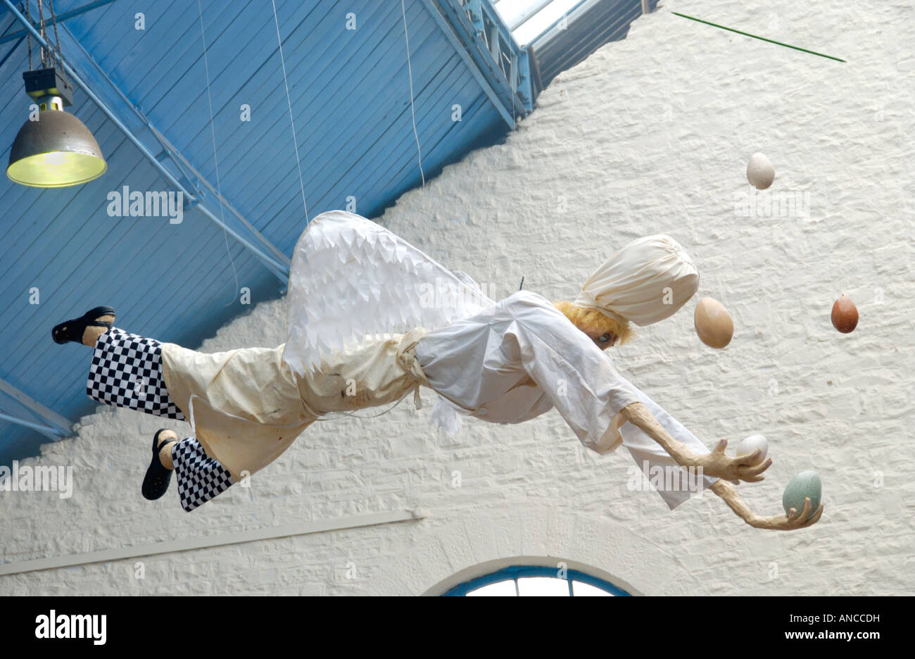 Chef sculpture juggling eggs hanging from roof of Market Hall at ...
