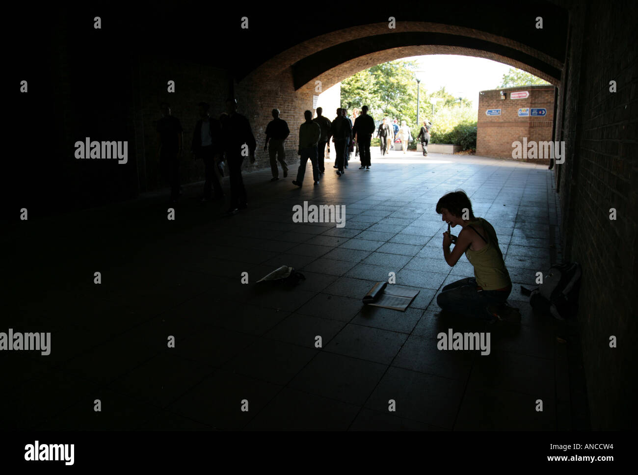 Street musician playing flute money hi-res stock photography and images ...