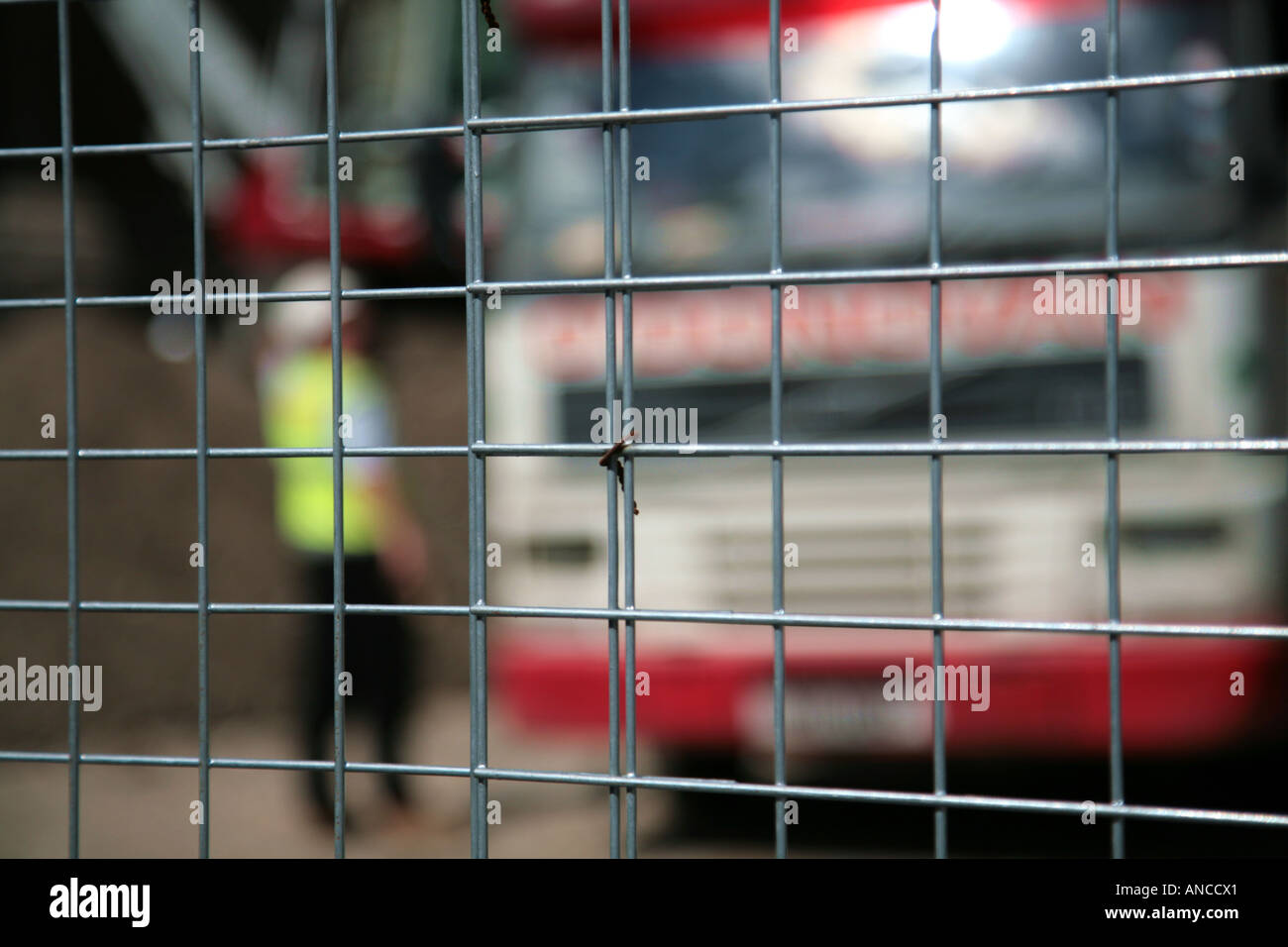 blurred image of lorry in construction site Stock Photo - Alamy