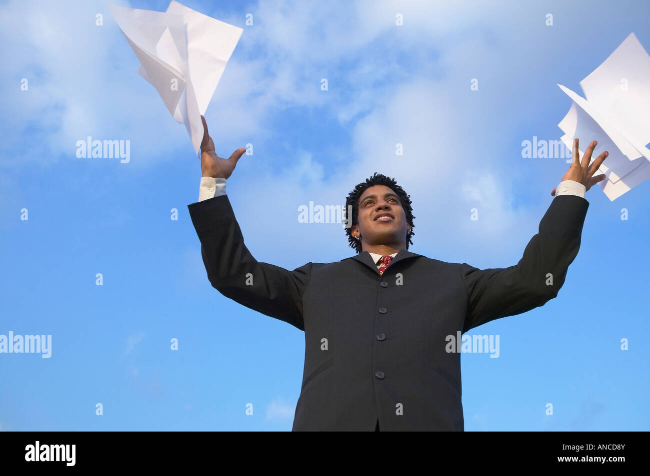 Throwing papers sky man hi-res stock photography and images - Alamy