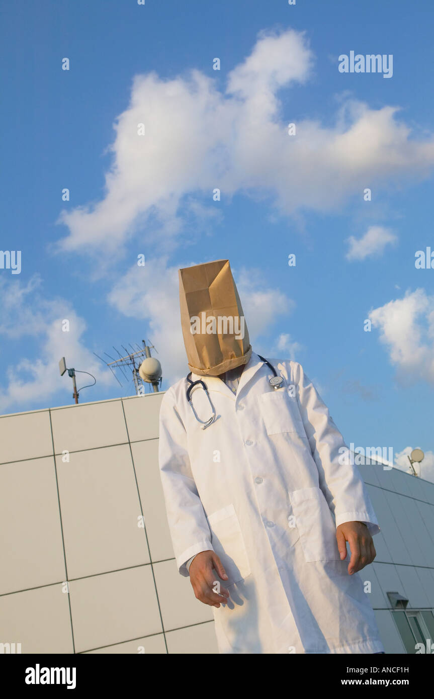 Blue coat over head hi-res stock photography and images - Alamy