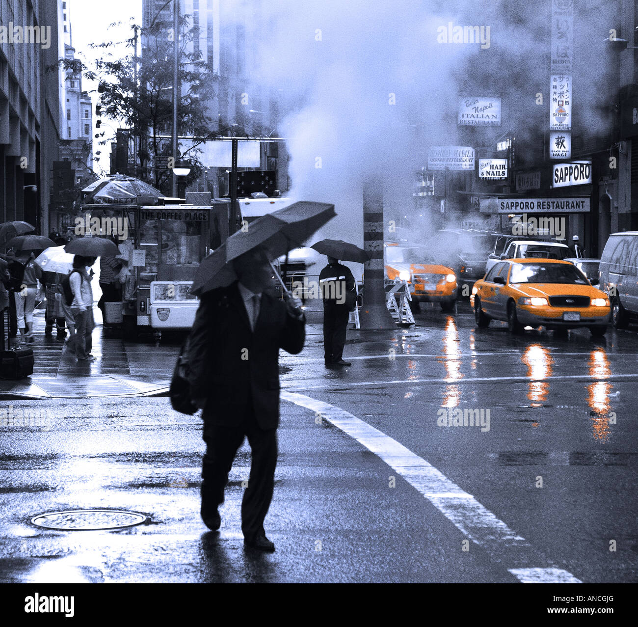 new york steam with man in rain Stock Photo - Alamy