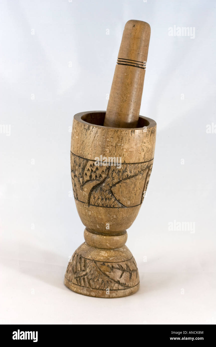Carved wooden pestle and mortar Malawi plain background Stock Photo - Alamy
