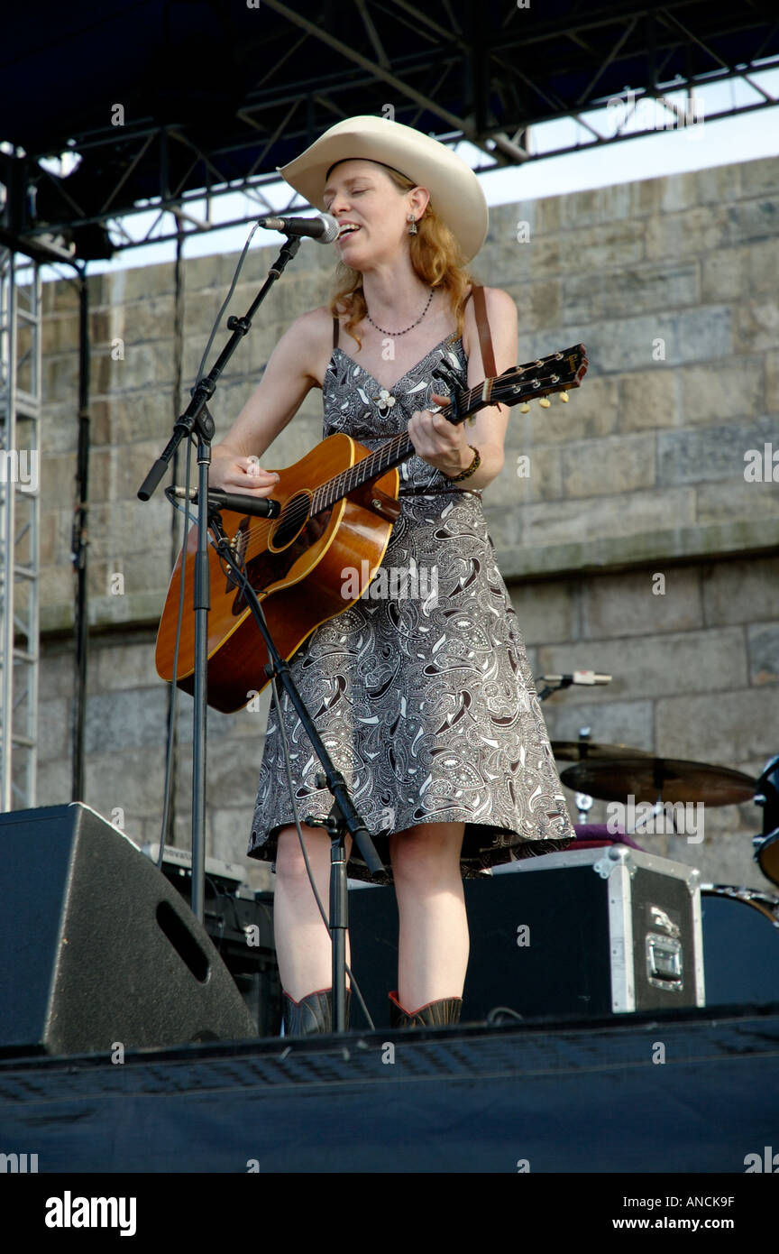Gillian Welch onstage at the Newport Folk Festival Stock Photo - Alamy