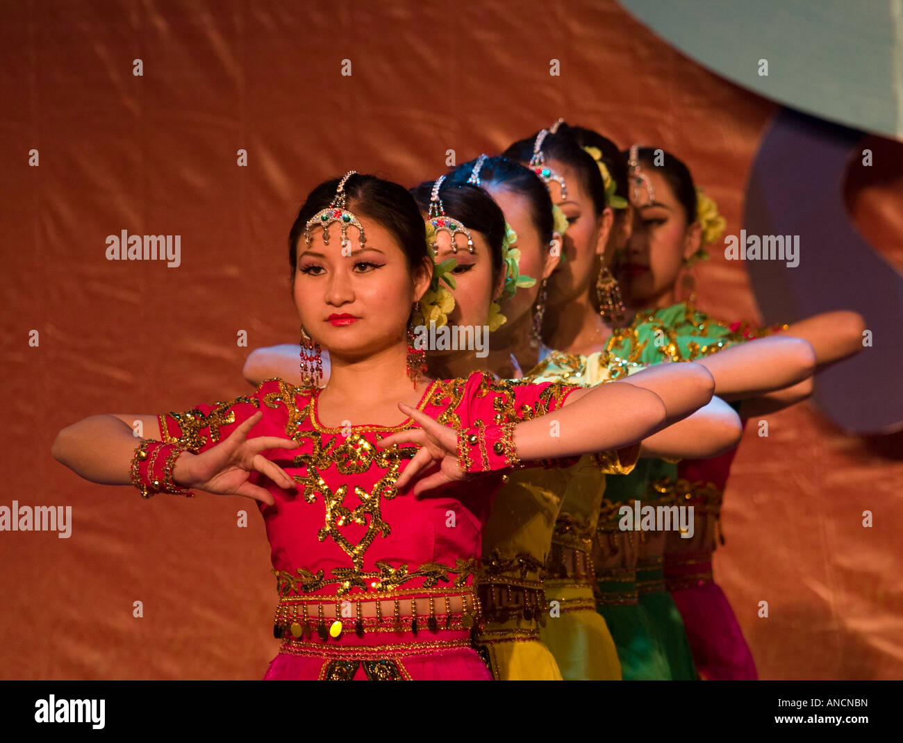 Chinese acrobats performing in traditional outfits Stock Photo - Alamy
