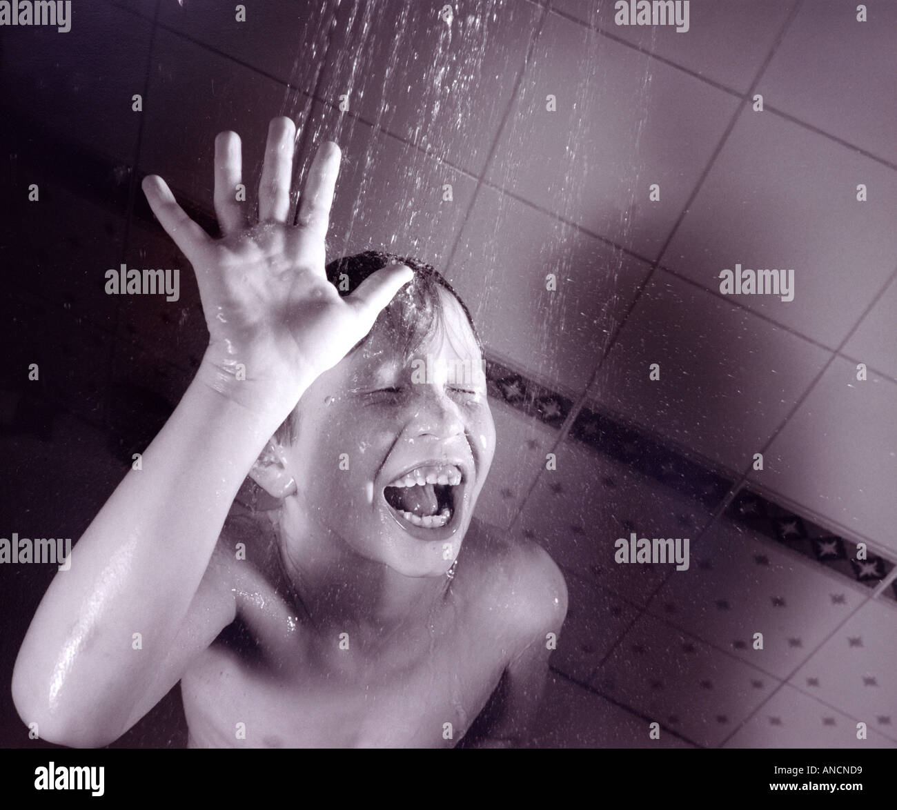 Boy and splash hi-res stock photography and images - Alamy
