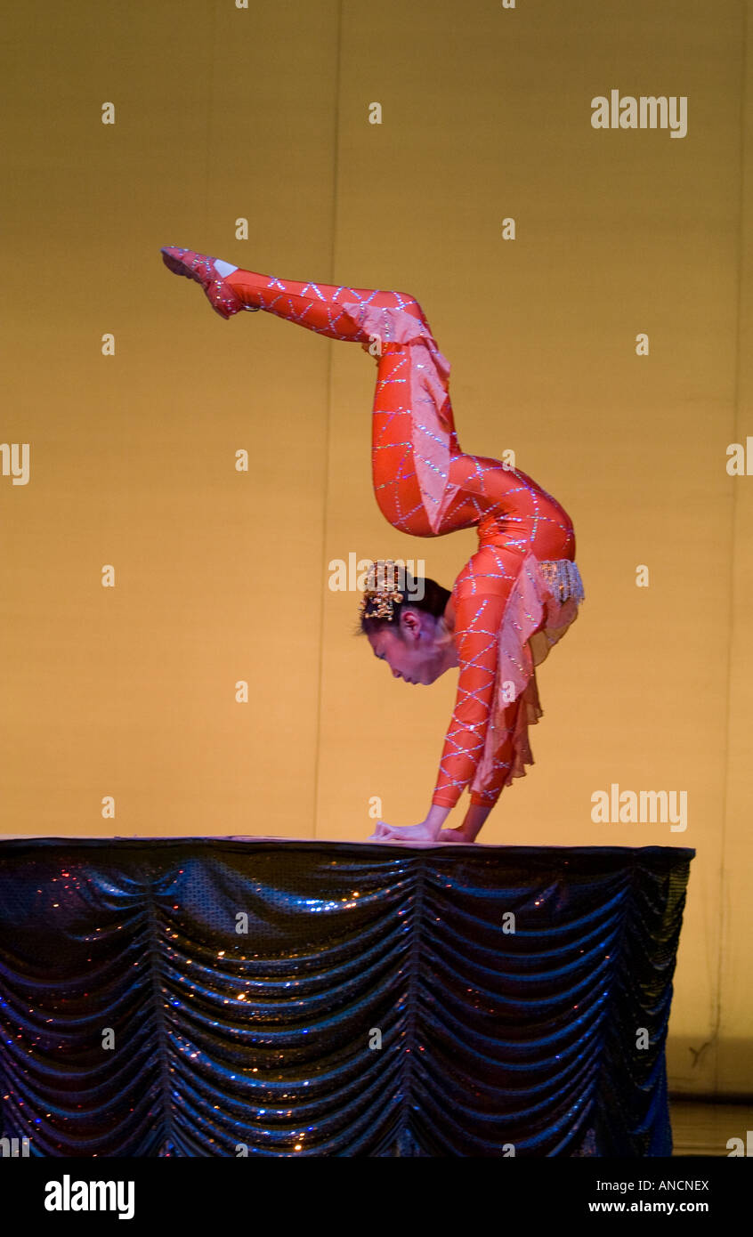 Chinese acrobat in a handstand Stock Photo - Alamy