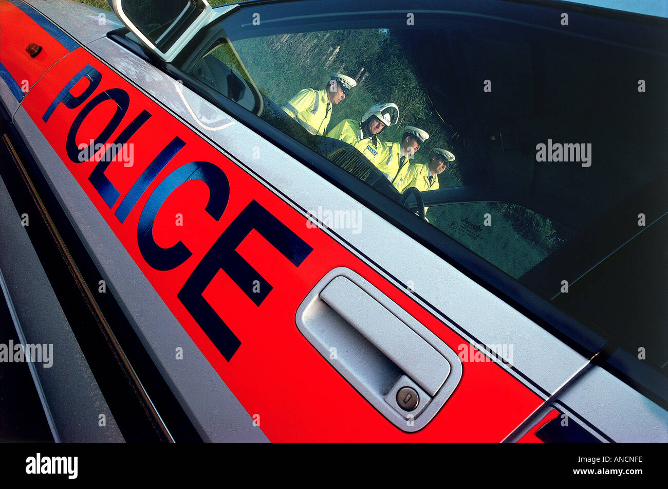 Policemen take a break during filming for BBC Top Gear magazine Stock ...