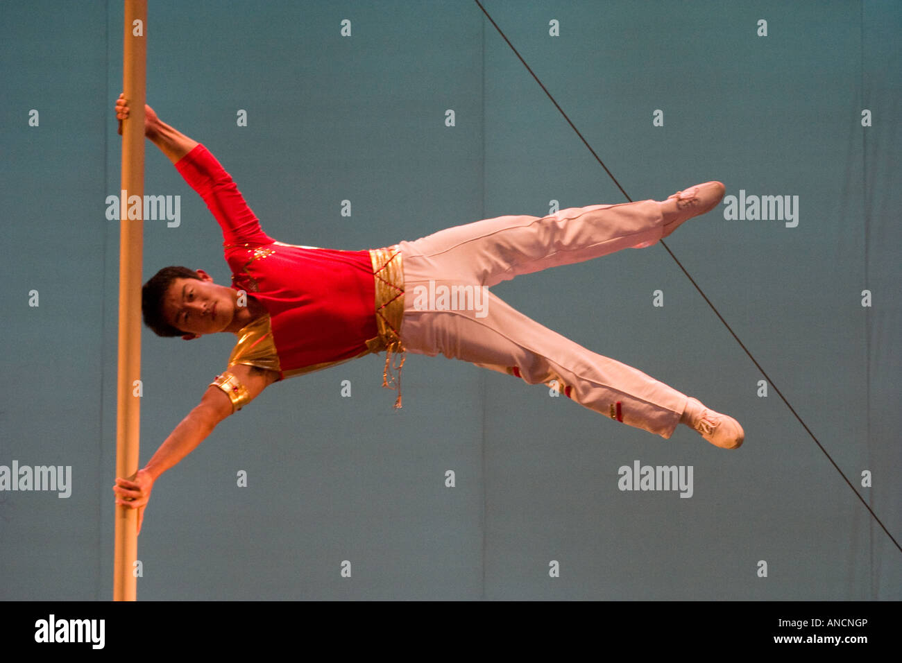 Acrobat doing Vertical Pushups Stock Photo - Alamy