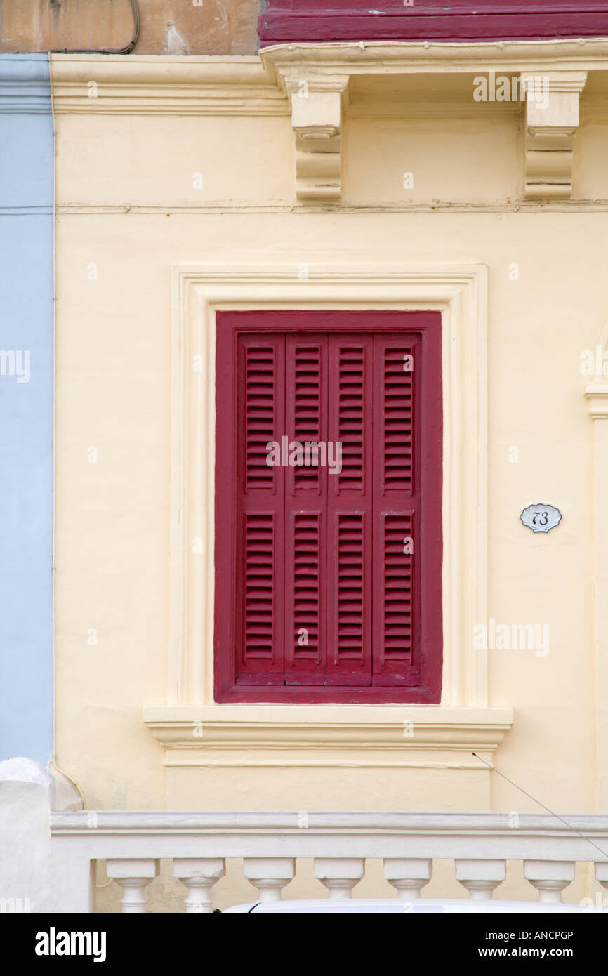 Colourful window shutters on window in Malta Stock Photo - Alamy