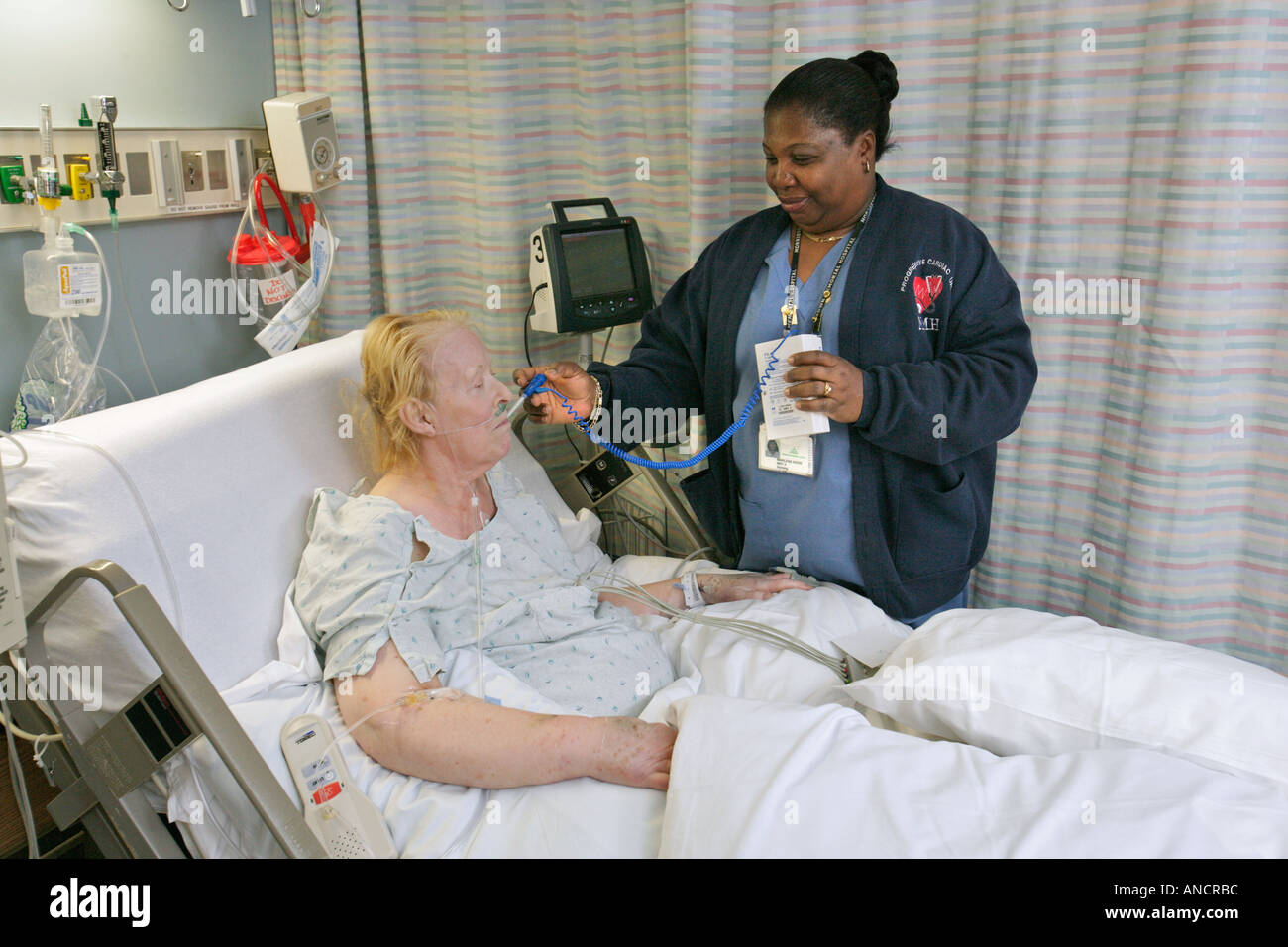Hospital Patient and Nurse Taking Temperature Stock Photo - Alamy