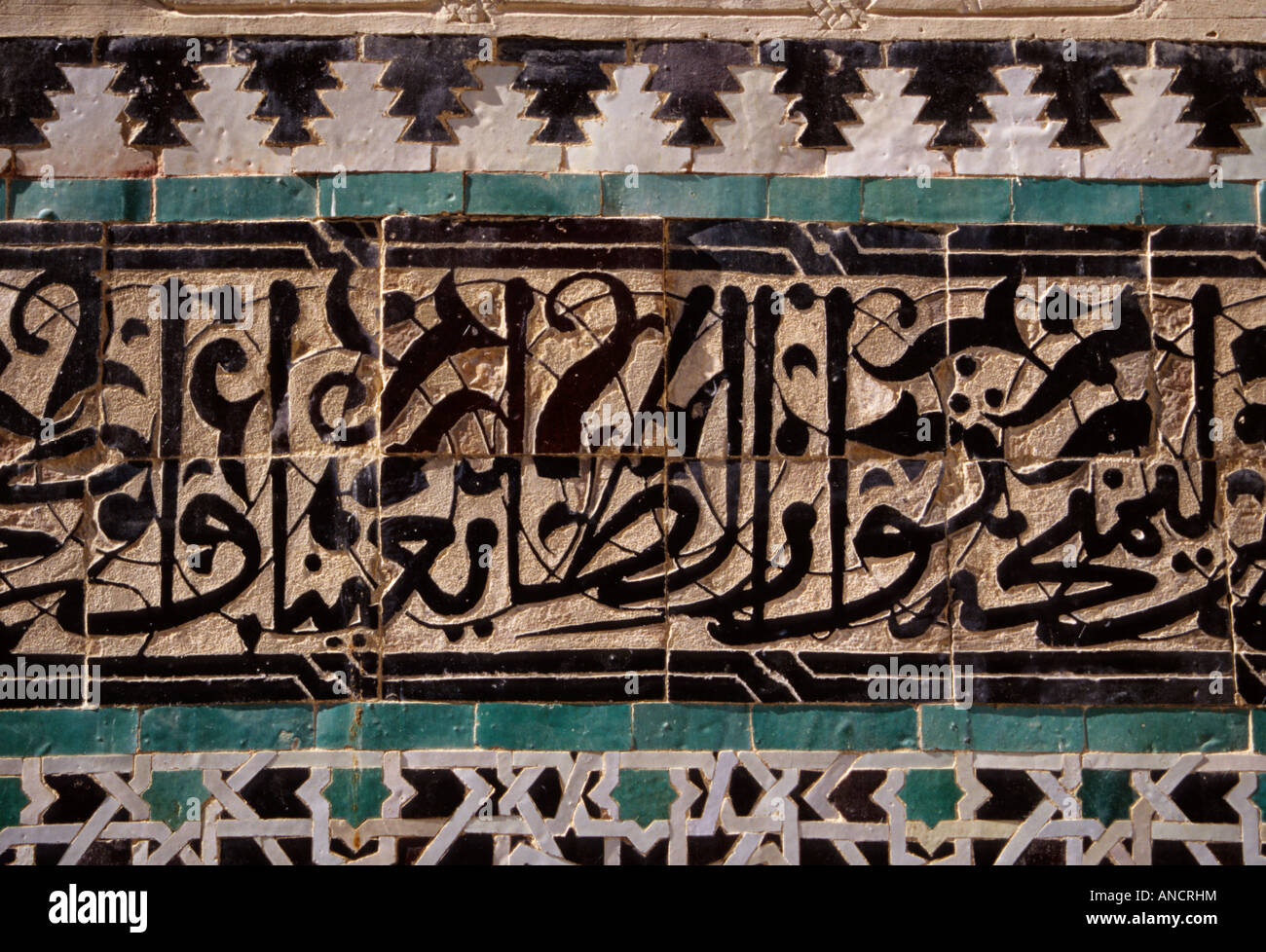 Zellij calligraphic frieze at courtyard of Medersa Bou Inania Fez ...