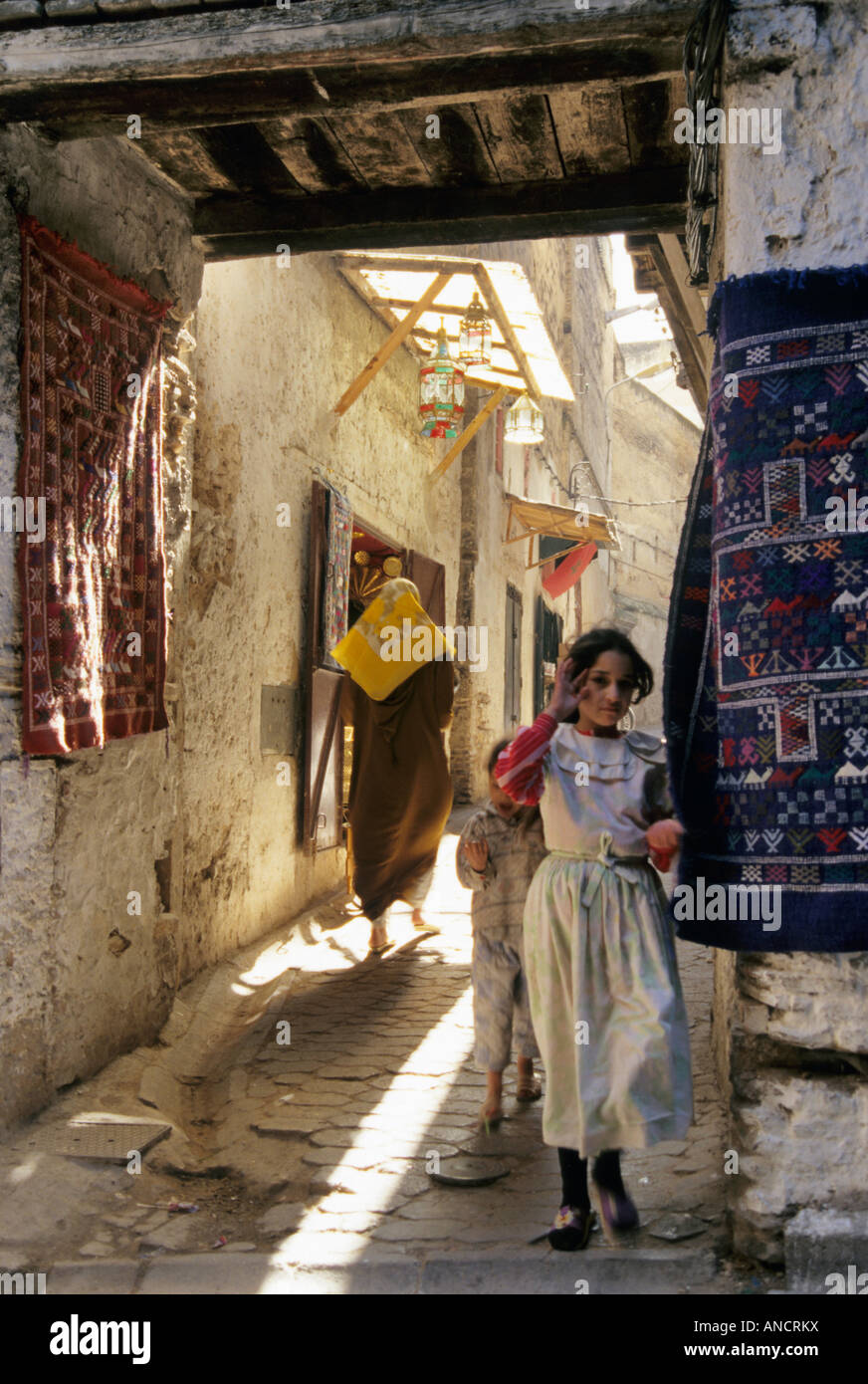 Girl at Rue Talaa Kebira Medina Fez Morocco Stock Photo - Alamy